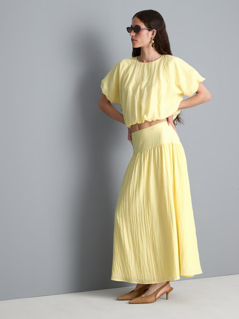 Drop-waist midi skirts are a versatile take on summer’s trending dress ...