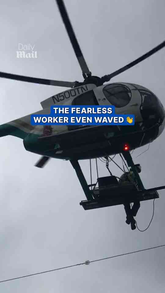 Helicopter worker shocks onlookers during dangerous power line repair