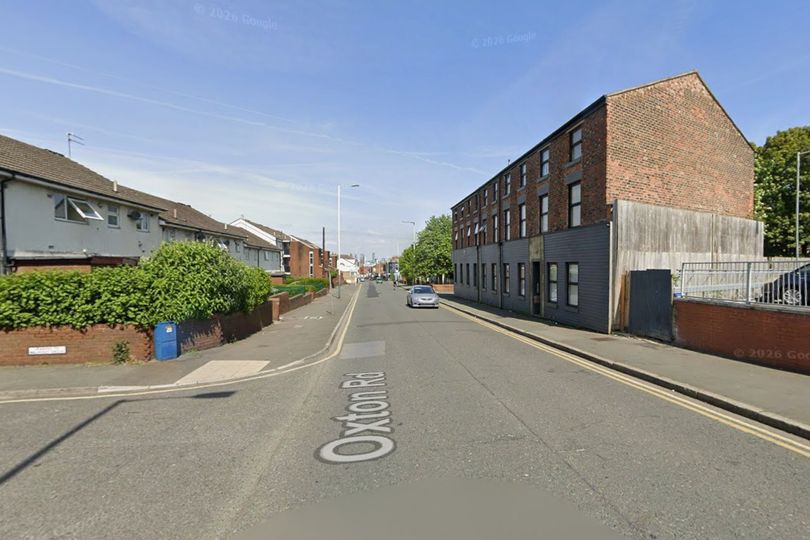 Masked gang burst into Birkenhead house and batter man with metal bar