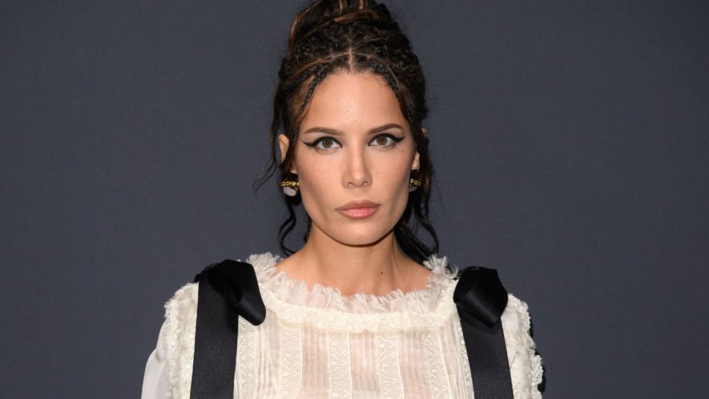 Halsey layers fully see-through Chanel top under micro minidress