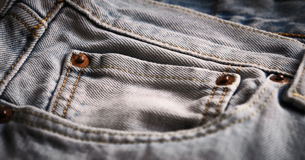 150-year-old reason why jeans have metal rivets on the pockets