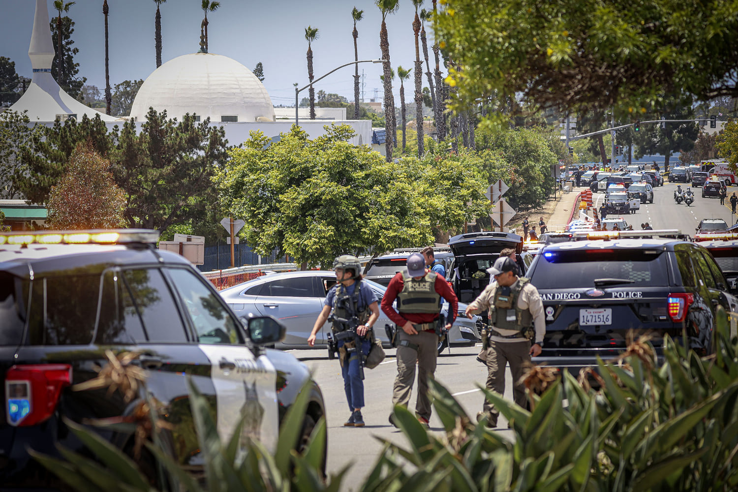 'Heroic' security guard killed protecting children and staff in San ...