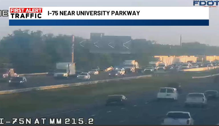 Rollover crash causes major I-75 backup Tuesday morning