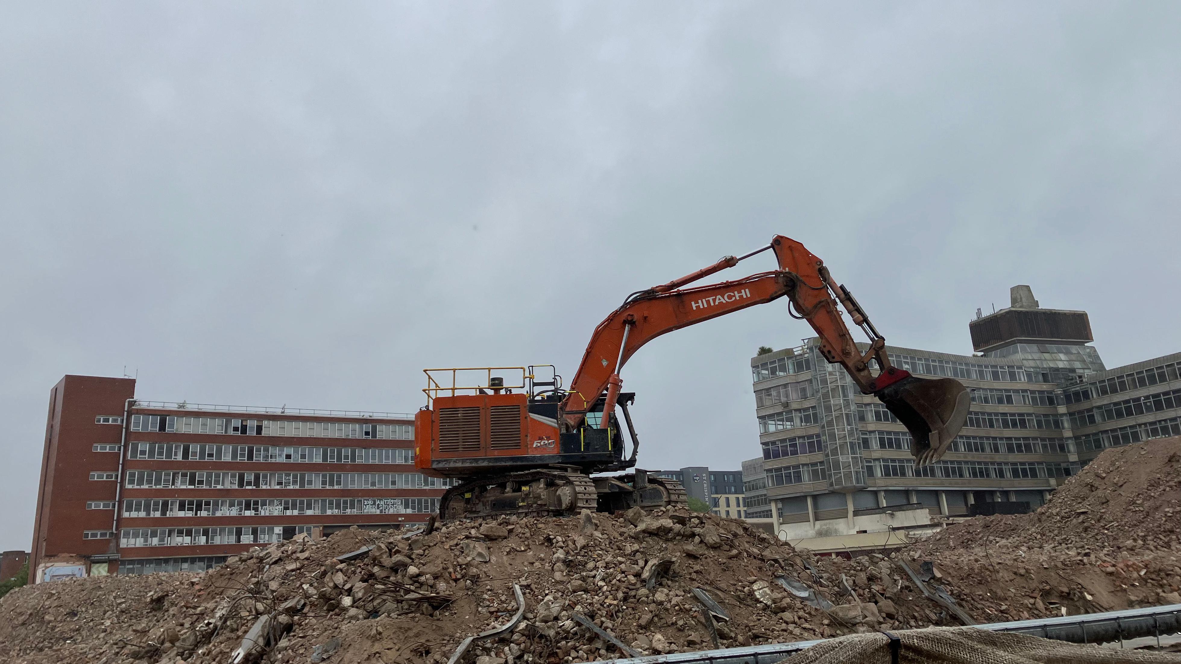 Shopping centre demolition taking longer than planned