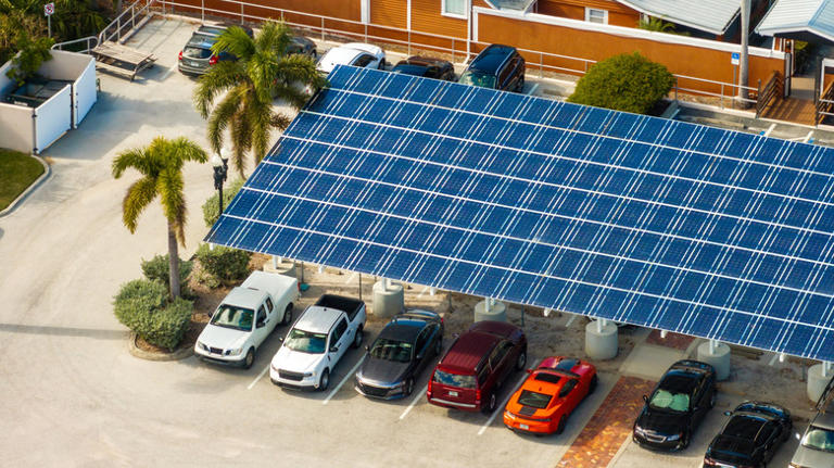 How many solar panels would it take to equal one nuclear reactor?