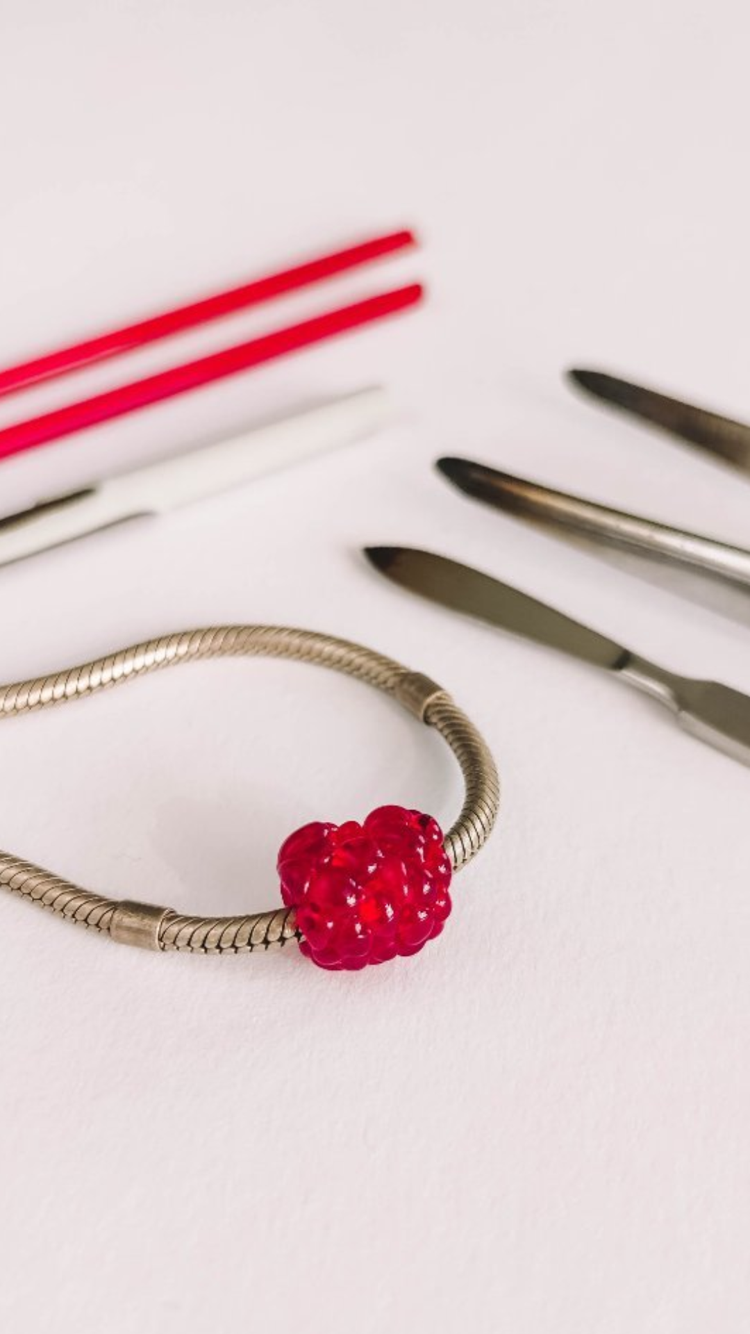 Turning molten glass into a realistic raspberry creation