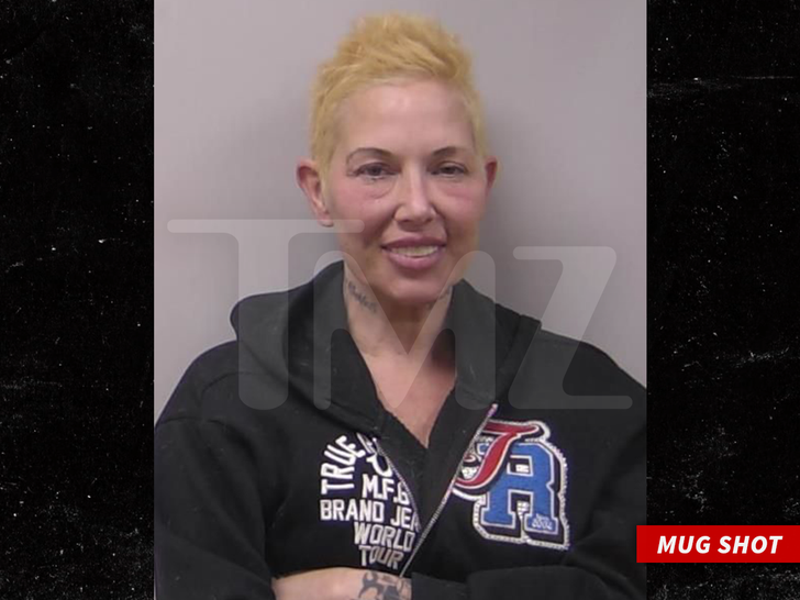 Eminem's ex-wife Kim Scott smiles in mug shot after second DUI arrest ...