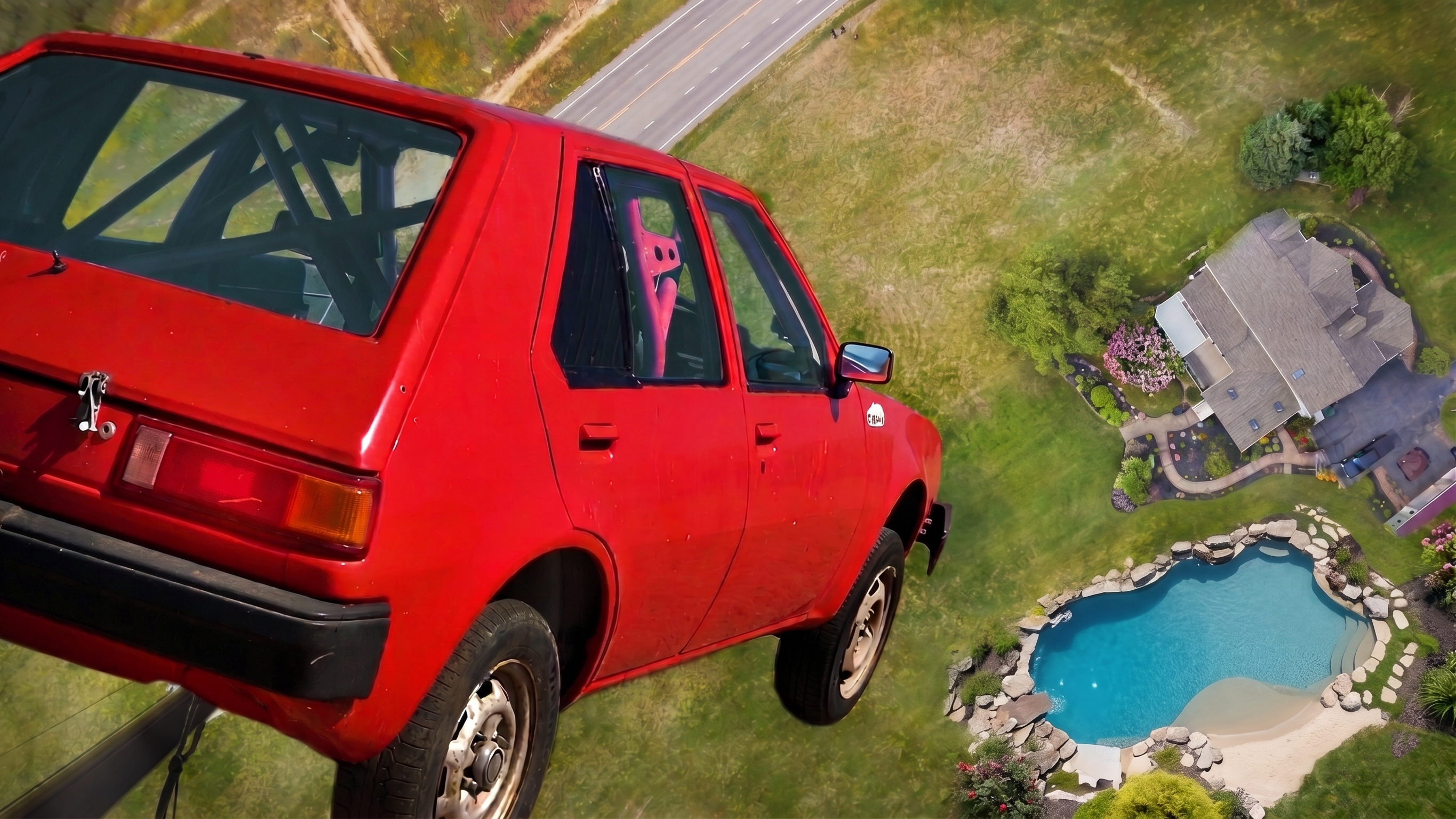Watch what happens when a car hits a swimming pool from 150 ft
