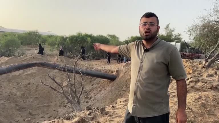 Palestinians in Khan Younis inspect damage after Israeli strike