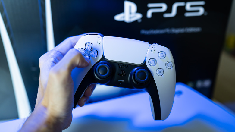 What does the blue light mean on a PlayStation 5 controller?