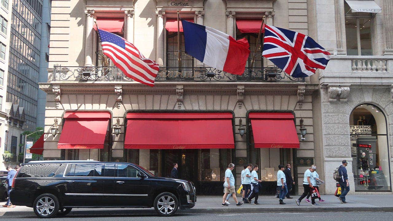 Woman dies after plunging into uncovered manhole outside luxury stores