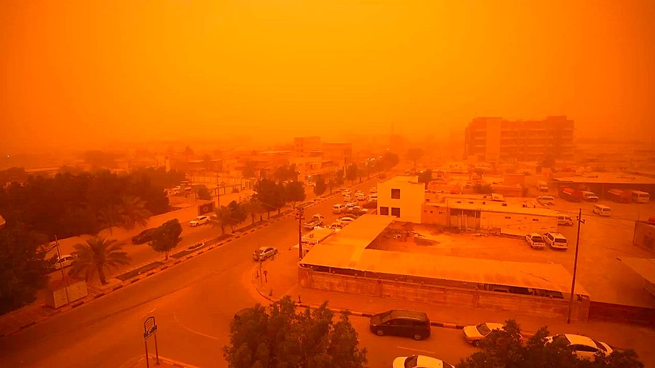 Massive dust storm blankets Iraq's cities in thick orange haze