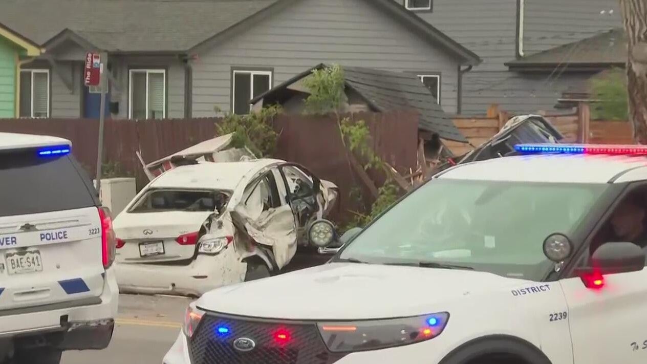 Denver police investigate crash that sent car into home