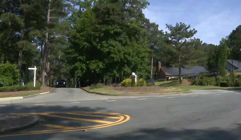 Student shot while waiting for school bus in DeKalb County