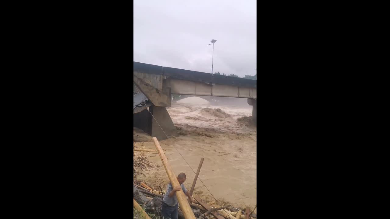 Flash floods destroy bridges in Shimen County, Hunan, China