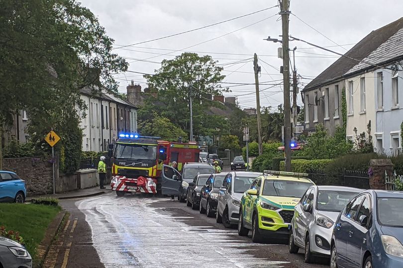 Watch: Fire crews scramble as car punctures fuel tank on Cork city street