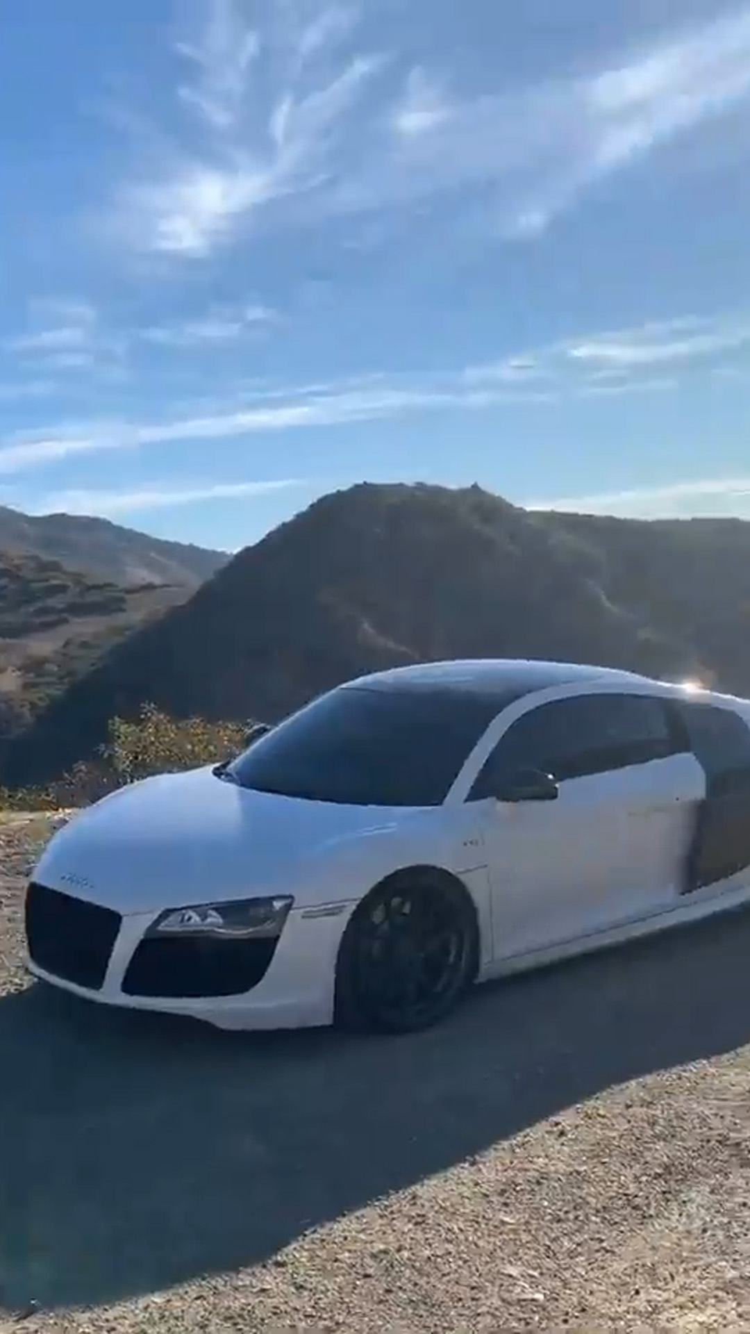 White Audi R8 with aggressive supercar styling