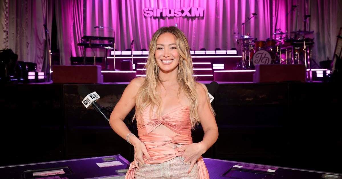 Hilary Duff's blinding backless Retrofete top is bold, see-through illusion
