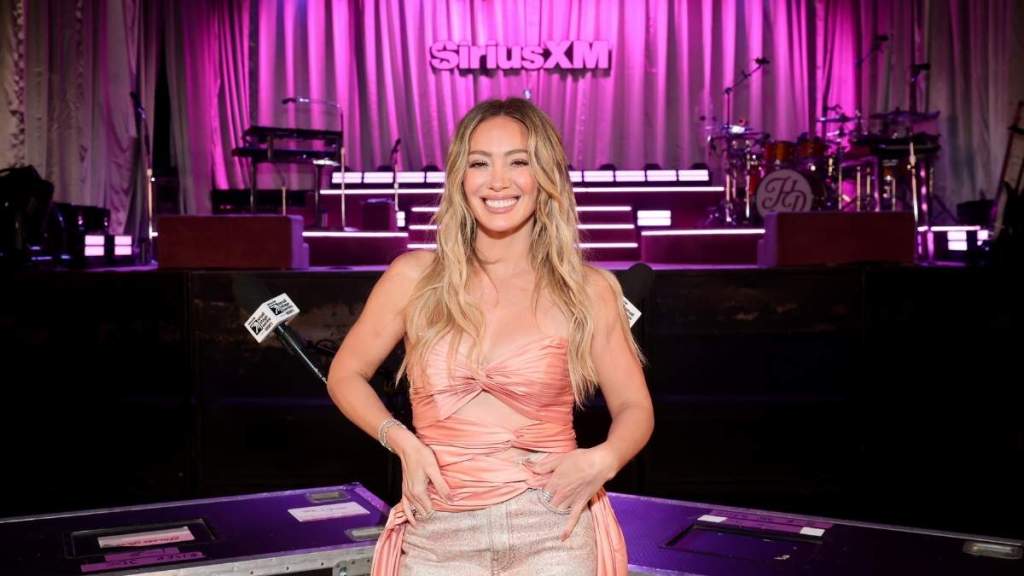 Hilary Duff's blinding backless Retrofete top is bold, see-through illusion
