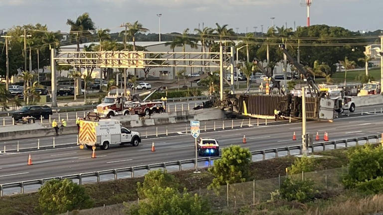 Semi-truck crashes over barrier, spills diesel fuel on I-95 in Boca Raton