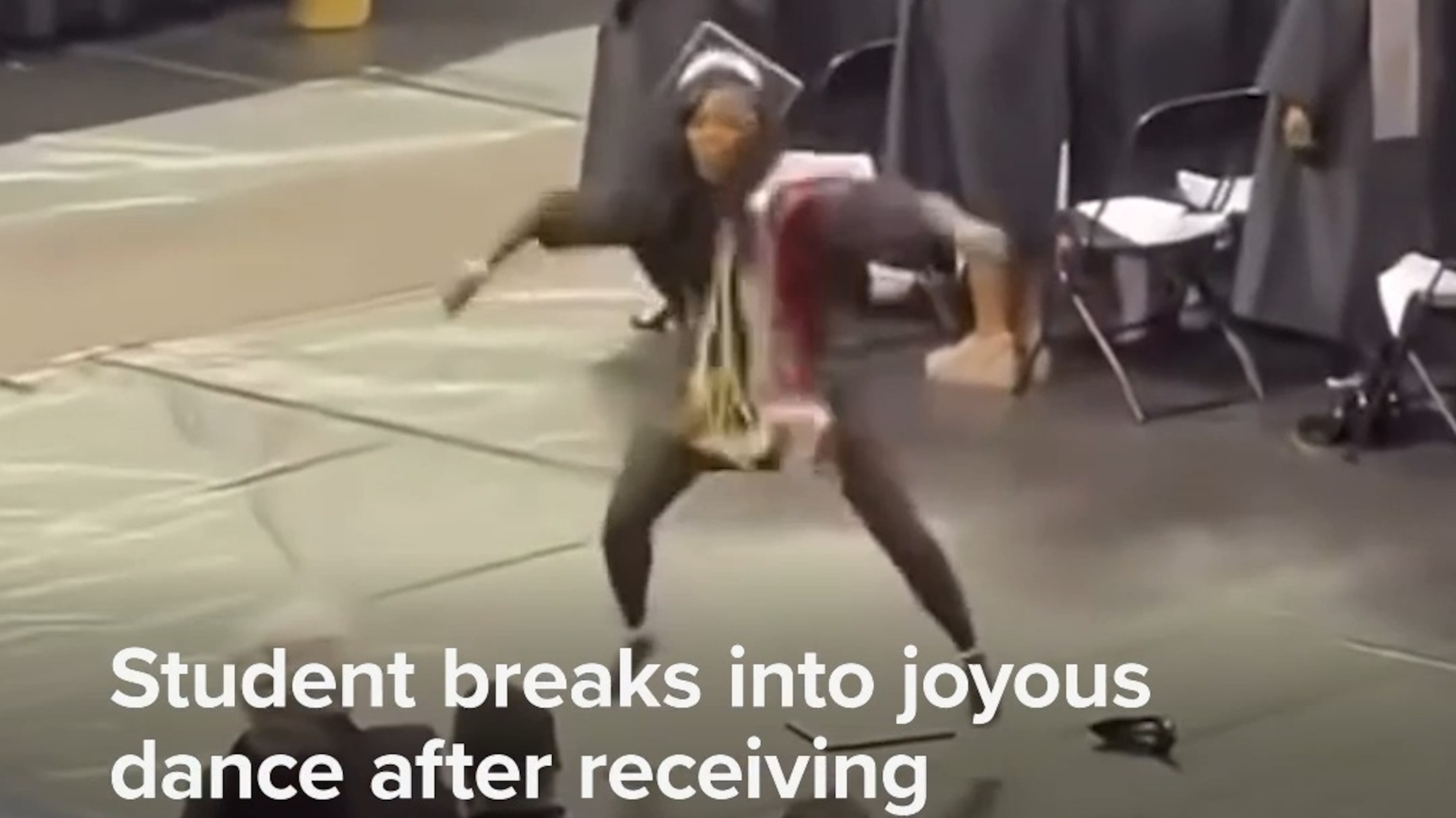 Student dances with joy at graduation
