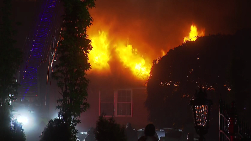 Crews knock down house fire after 'smoke explosion' in East Greenwich