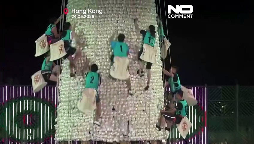 Climbers race up giant bun tower at Hong Kong’s colourful Bun Festival