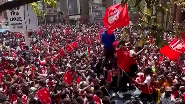 Fans in Nairobi celebrate as Arsenal crowned Premier League champions