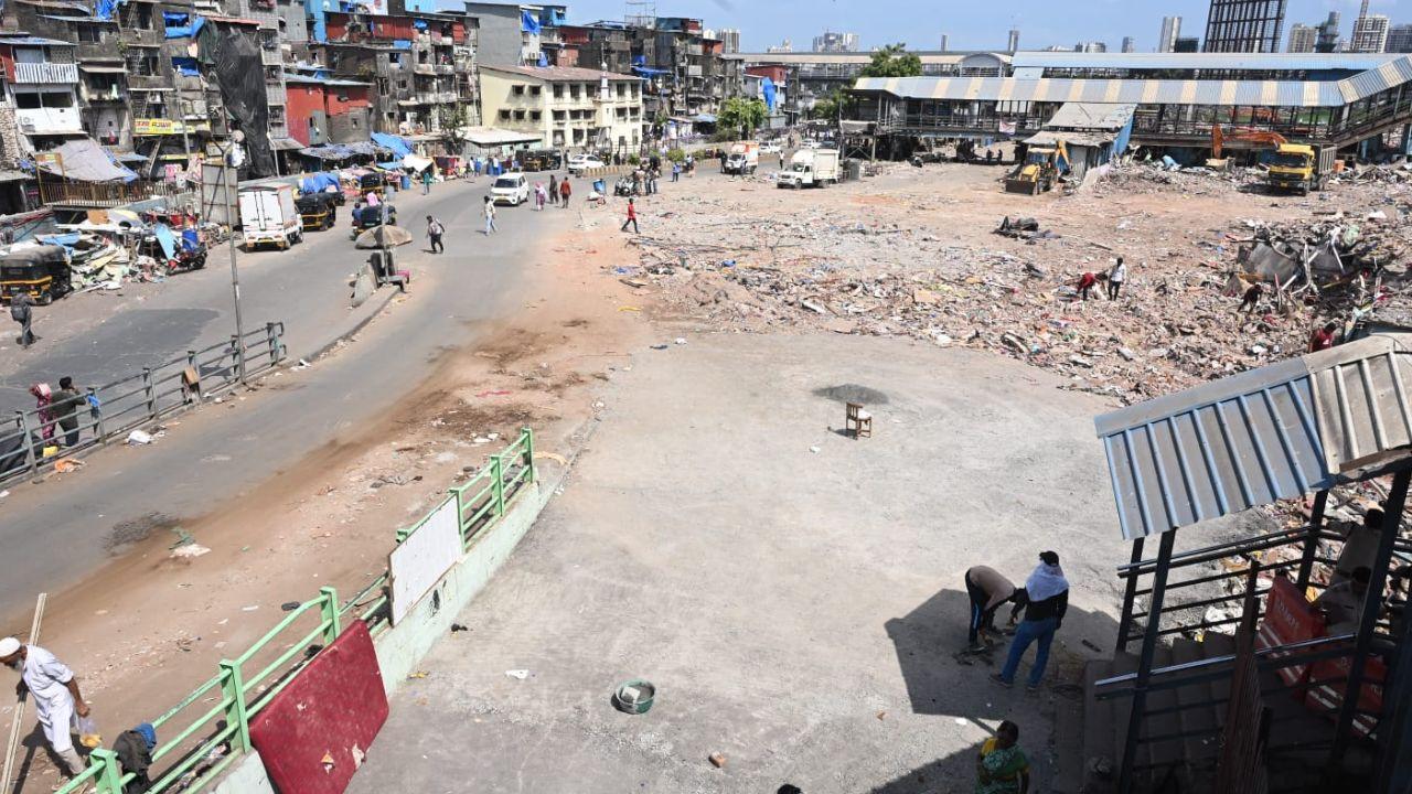 In photos Garib Nagar cleanup begins as debris removal starts after ...