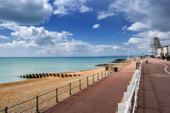 Man dies on packed Hastings beach as police and paramedics swarm area