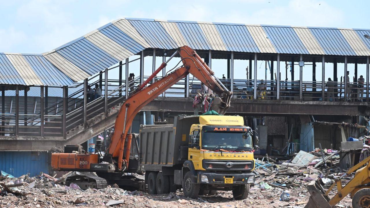 In photos Garib Nagar cleanup begins as debris removal starts after ...
