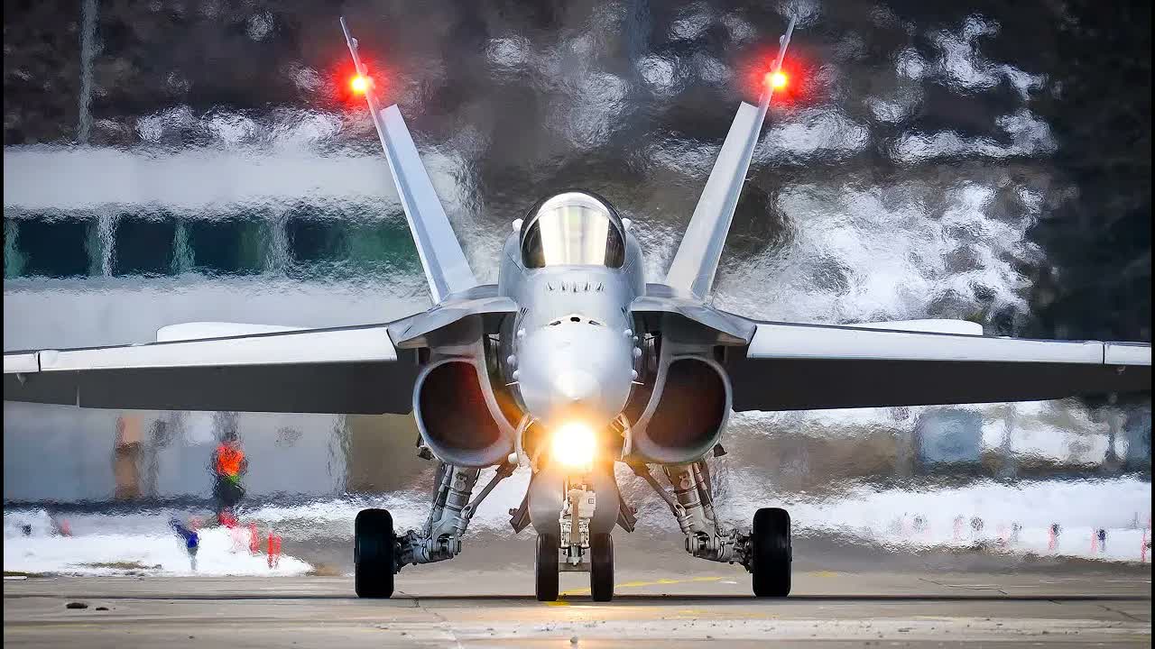 Watch Swiss F/A-18 Hornets explode out of a hidden mountain air base