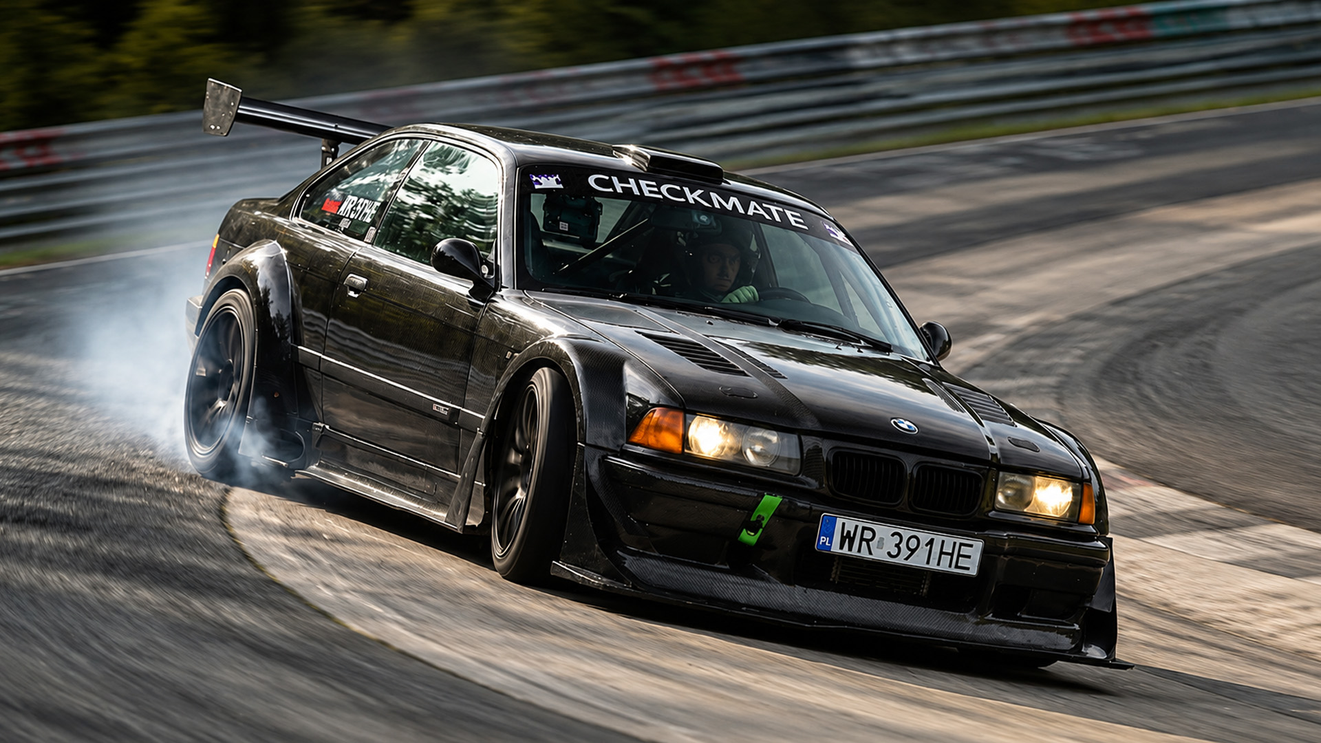 Classic full carbon BMW E36 struggles for grip on track corner