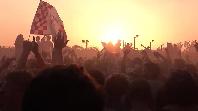 Jubilant Arsenal fans celebrate title success outside Emirates