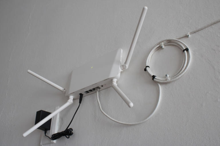 Why do they recommend placing a coin on your Wi-Fi router, and what ...