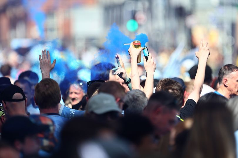 In photos: Manchester turns blue as huge Man City parade makes its way ...