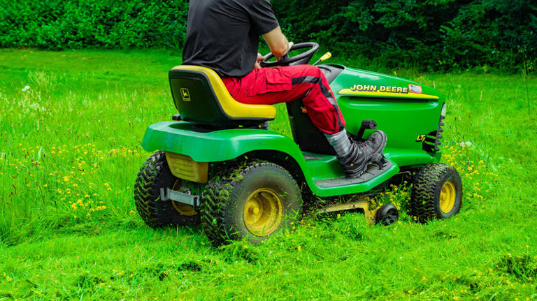 How are rear engine mowers different from lawn tractors?