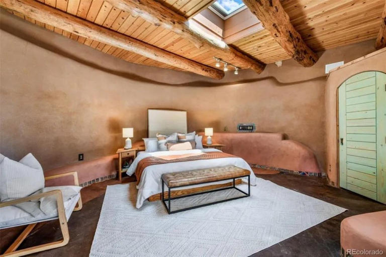 Sustainable earth home made from mud and old cans hits the market in ...