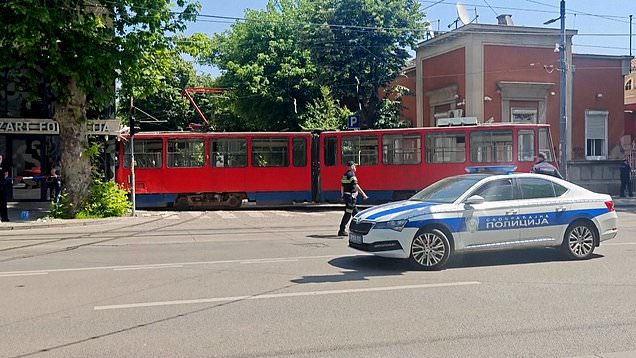 At least 12 injured after tram derails and crashes into building