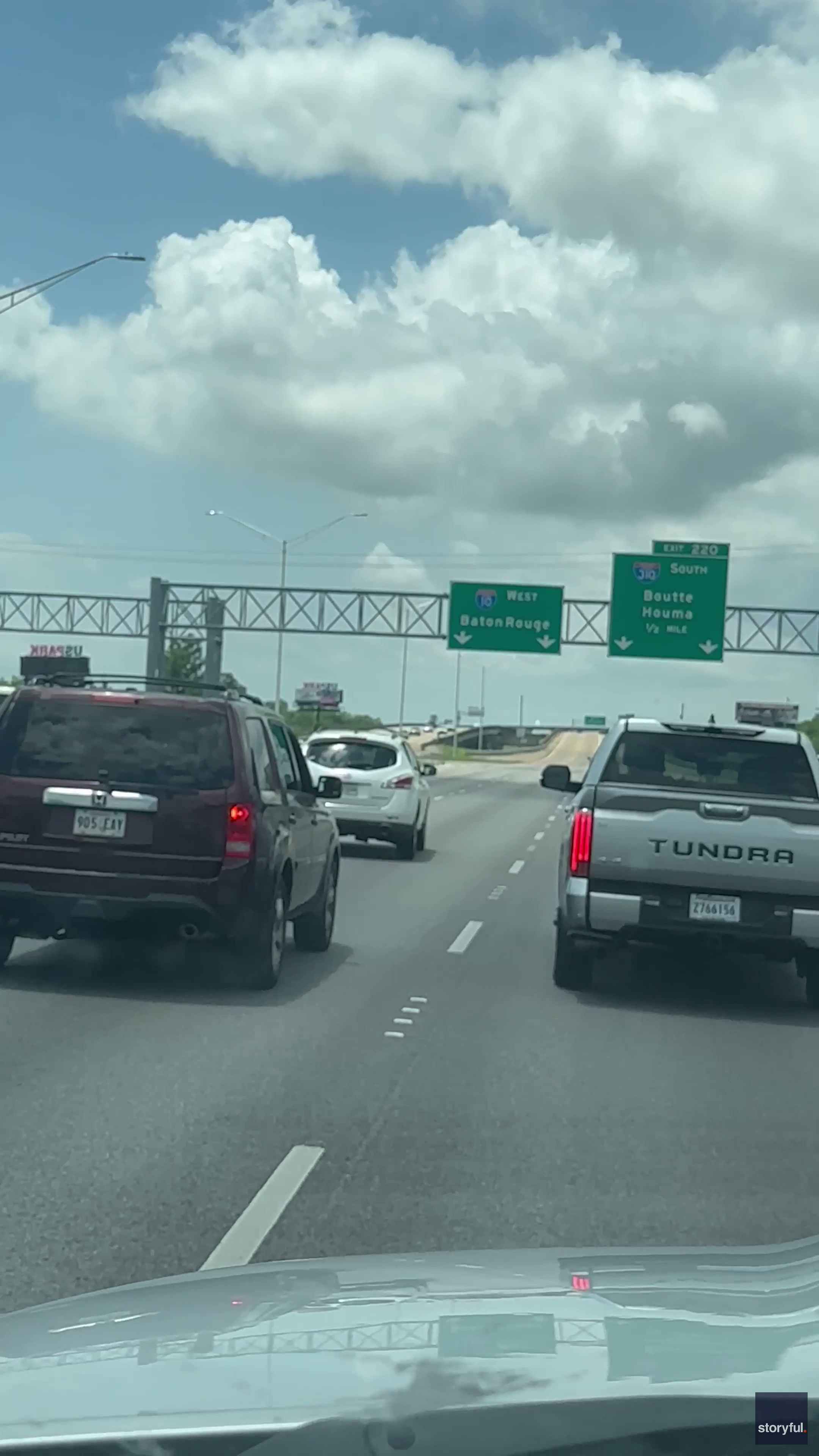 Drivers surround swerving vehicle on interstate to protect other motorists
