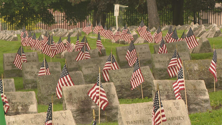 WNY community honors fallen military members with flag-placing tradition
