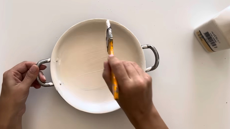 Don't toss an old pan: Turn it into chic and functional decor