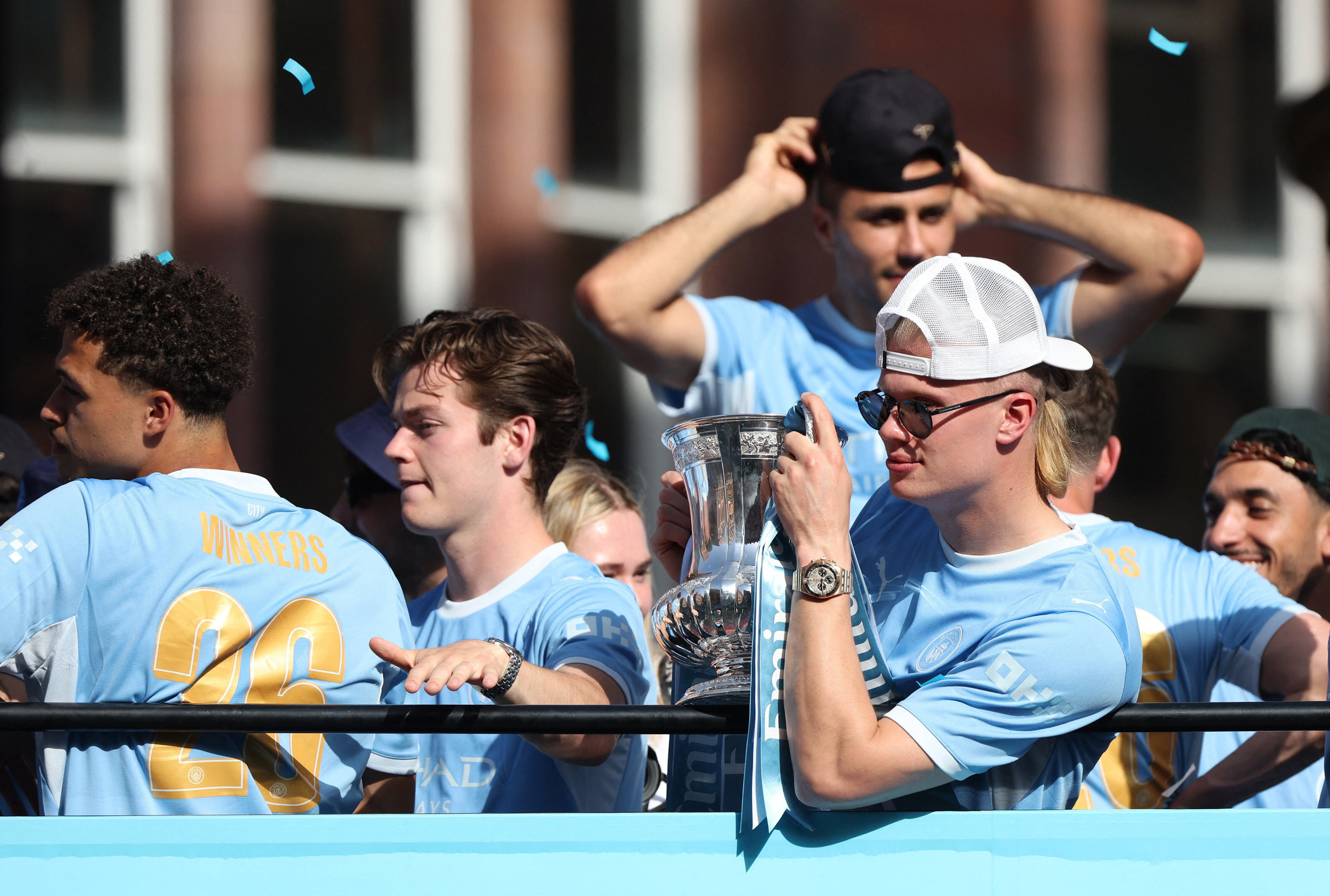City paint Manchester blue during grand trophy parade