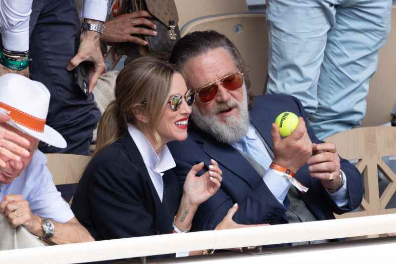 At 61: Russell Crowe and 42-year-old girlfriend Britney Theriot pack on PDA