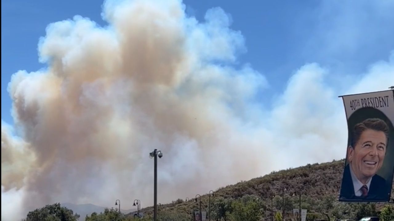 Dense smoke billows from a fire in Simi Valley