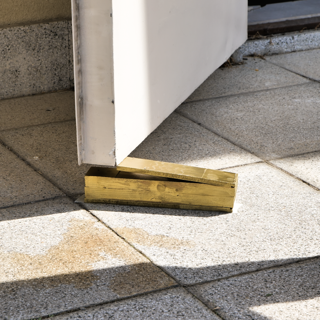 Creating a floating doorstop with wood