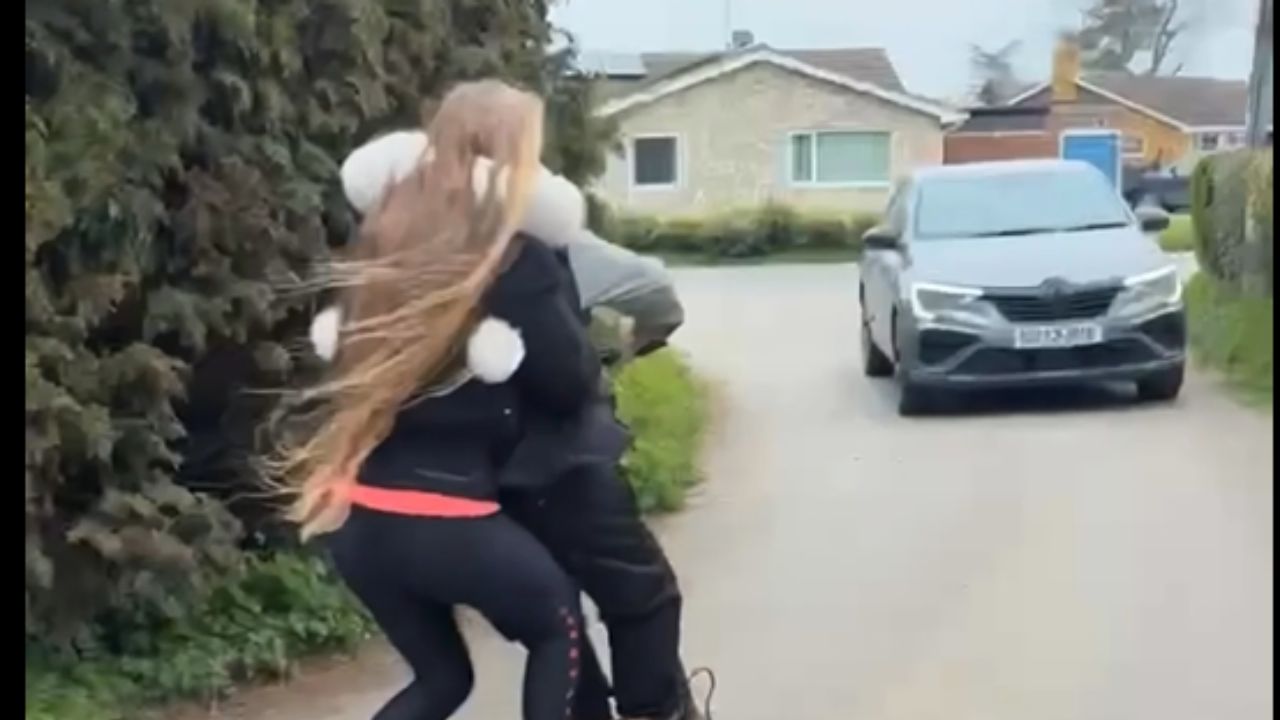 Two riders lose balance on a corner turn