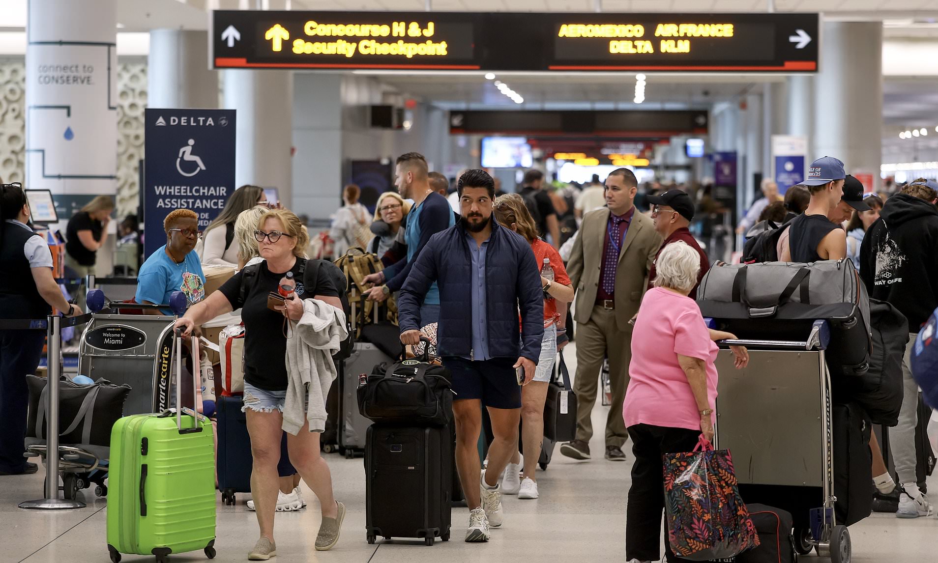 Memorial Day travel chaos as two terminals at Miami airport are ...