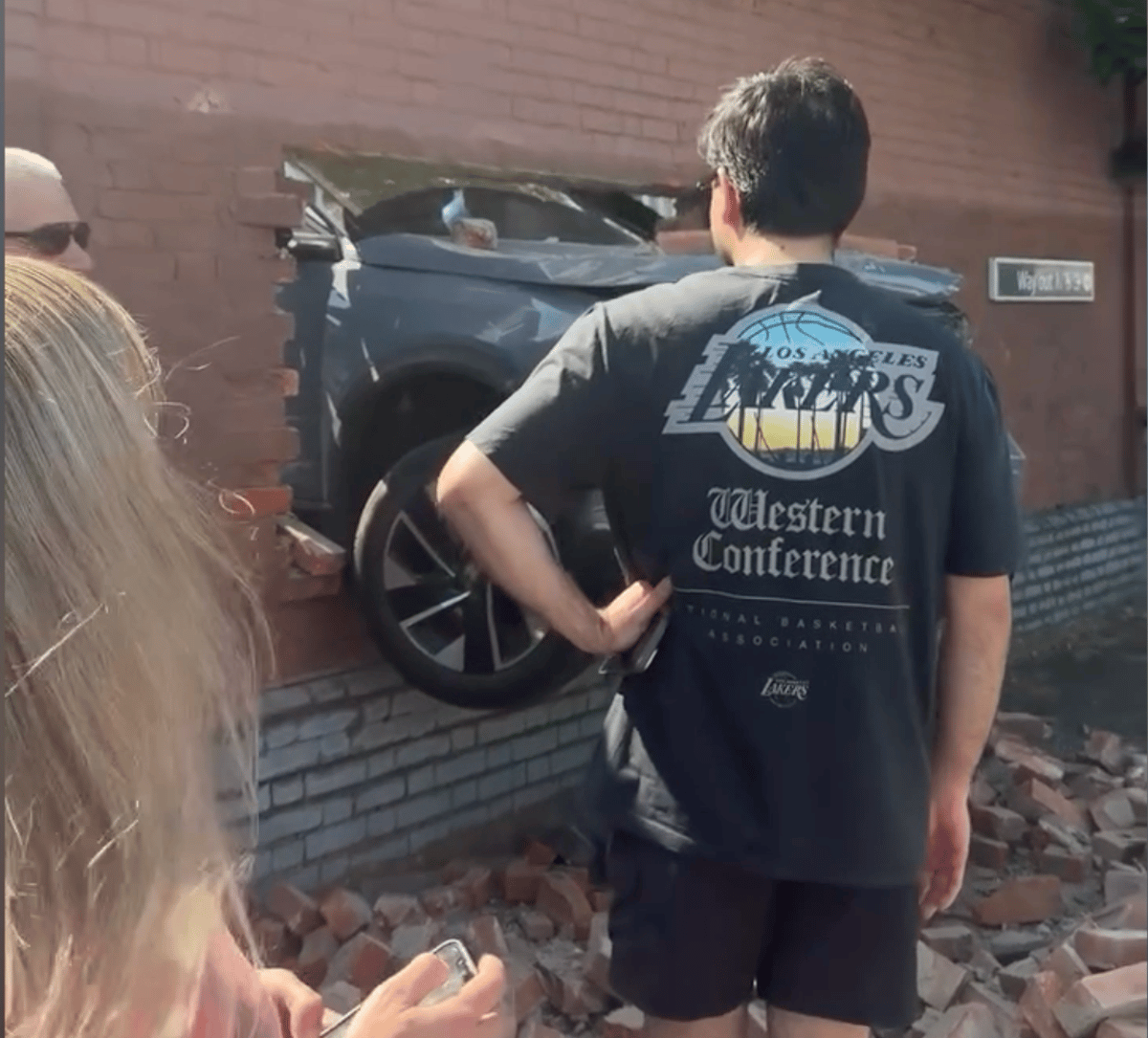 Passengers stunned after car smashes through wall at Streatham station