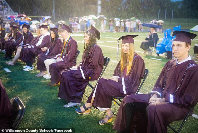 High school faces backlash as graduation is held in torrential downpour